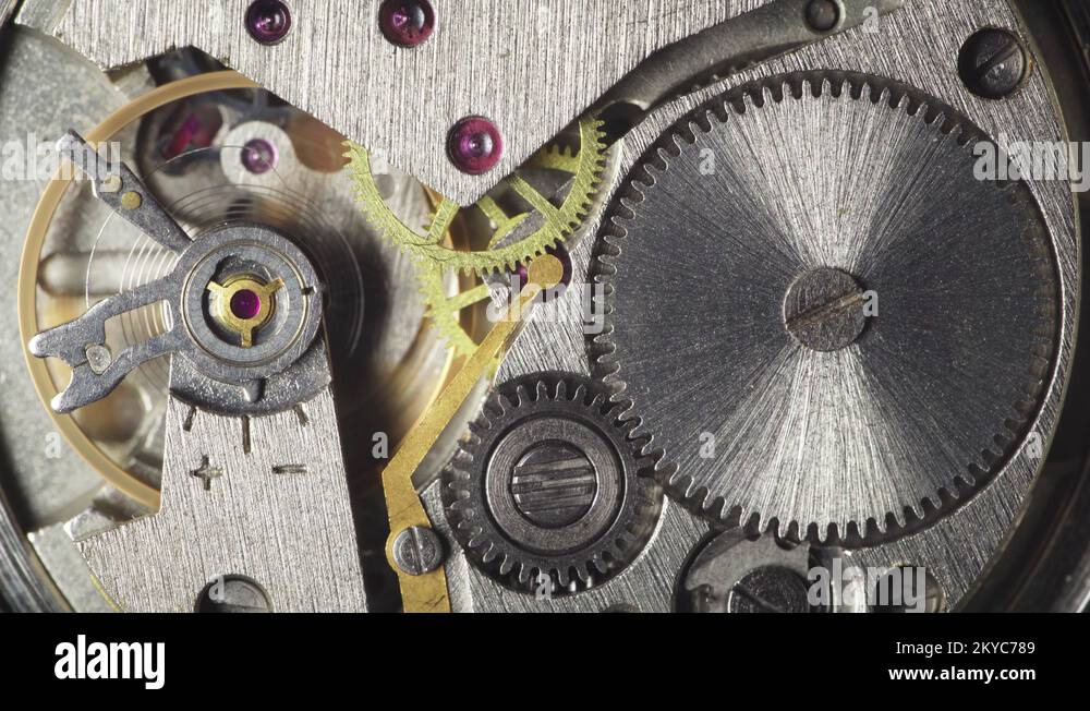 Mechanism of the old wristwatch. Movement of the clockwork pendulum ...