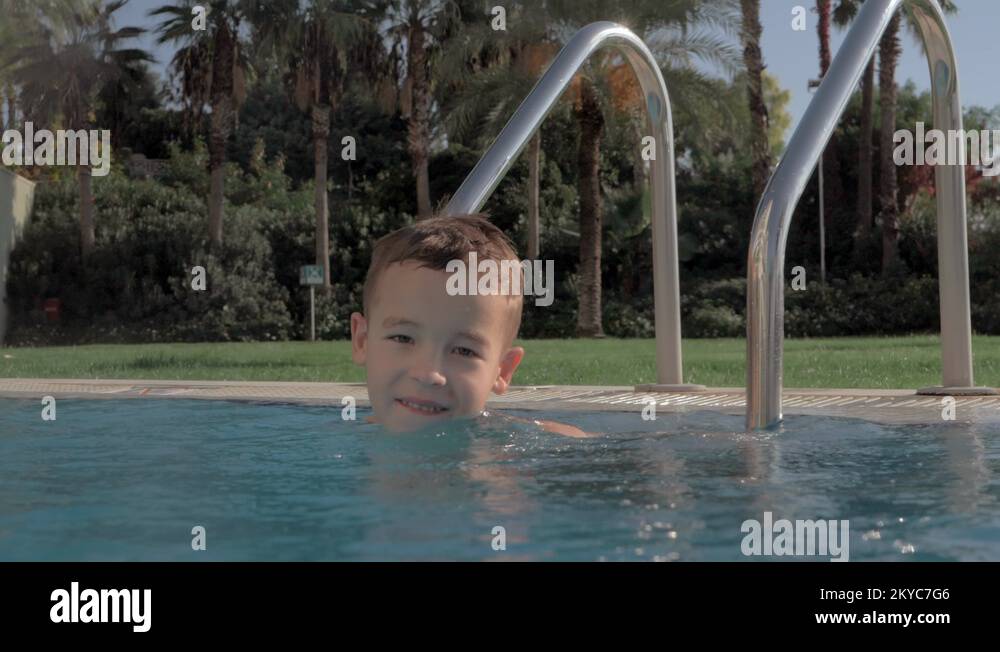 Kid splashing in pool Stock Videos & Footage - HD and 4K Video Clips ...