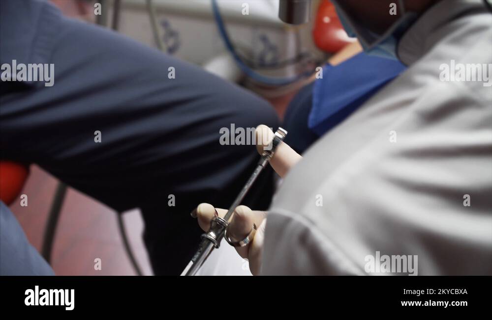 Dentist is making an injection in patient's gum Stock Video Footage - Alamy