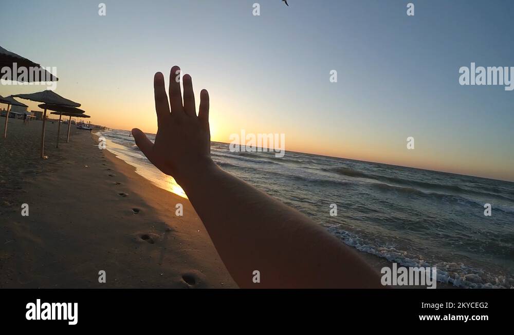 Hand fingers sun sunset beach Stock Videos & Footage - HD and 4K Video ...