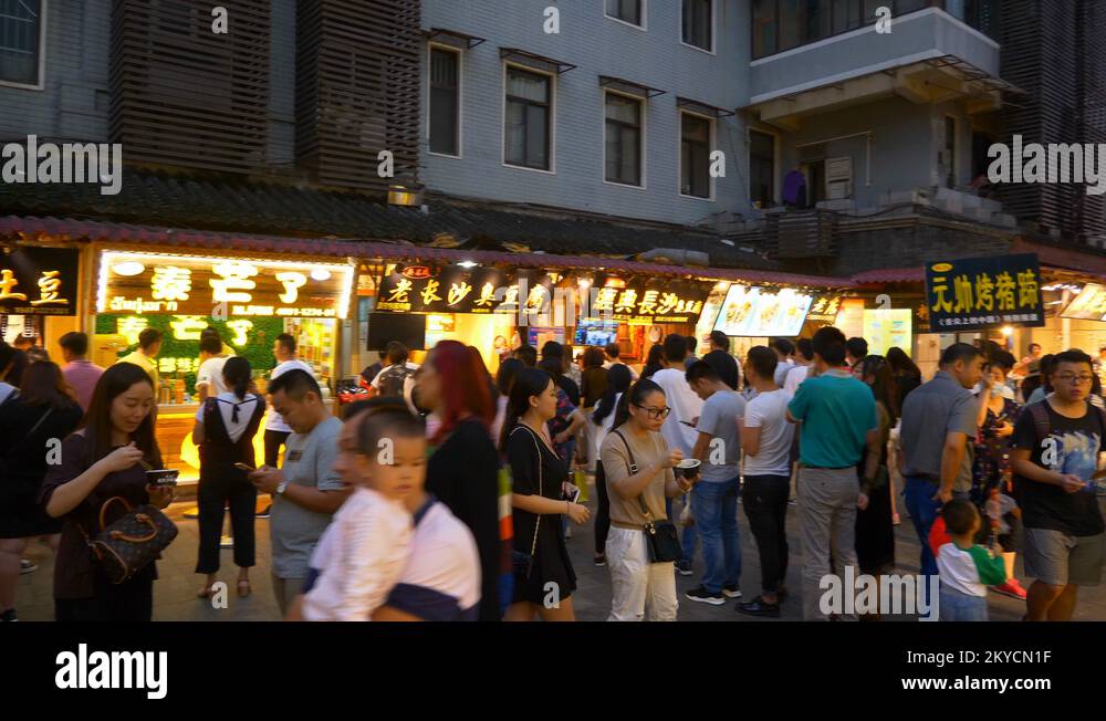 evening time wuhan city famous walking street slow motion panorama 4k ...
