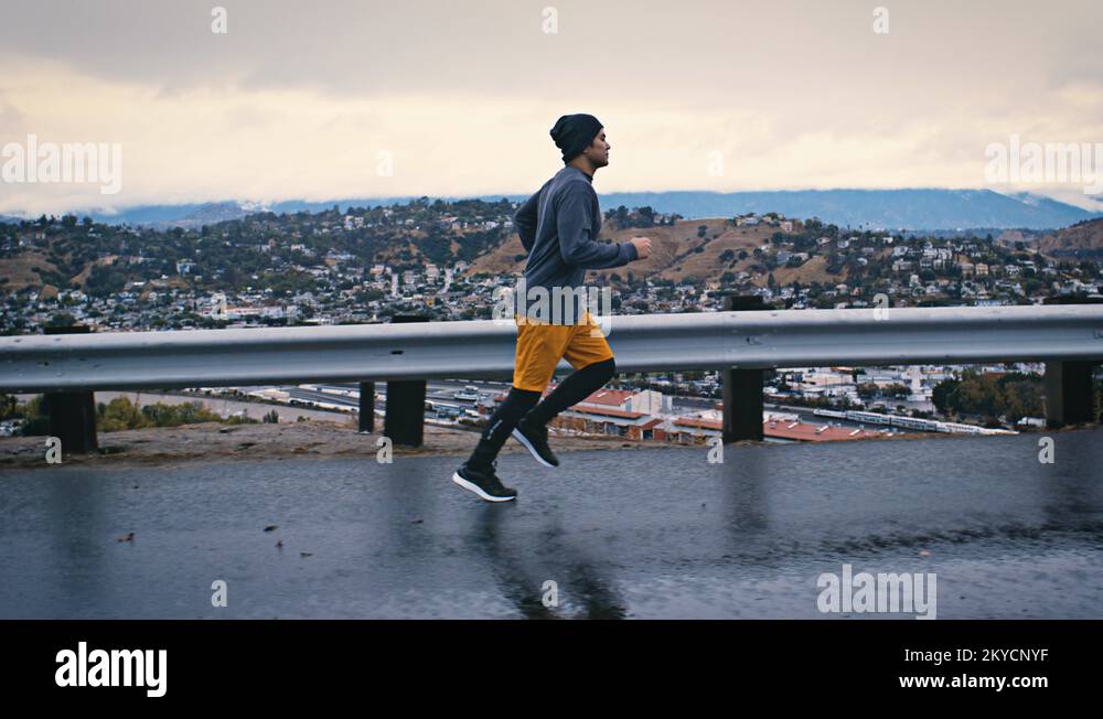 Man running rain Stock Videos & Footage - HD and 4K Video Clips - Alamy