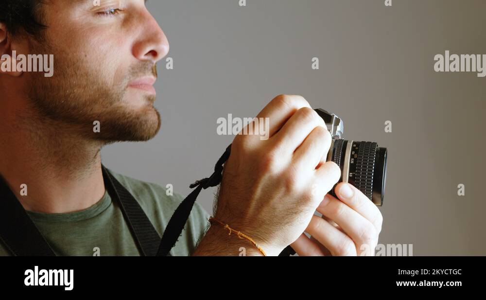 Male photographer clicking photos with camera 4k Stock Video Footage ...