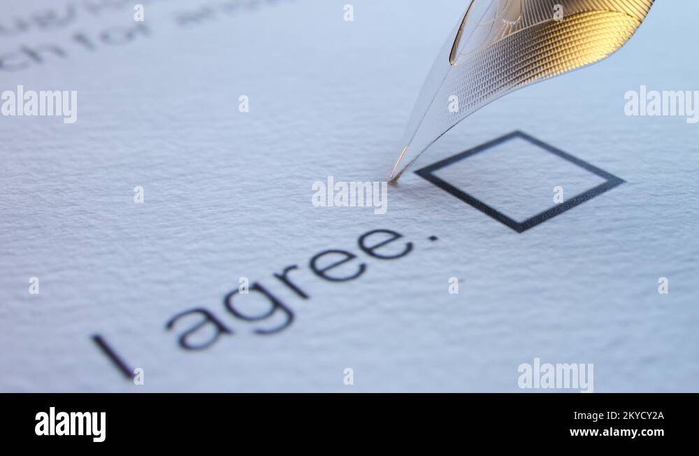 "Close up of a quill pen making a check sign with ink in an empty ...