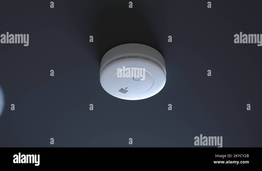 "Dense smoke gathering around a smoke detector. Activated alarm. Light ...