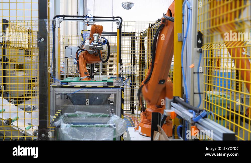Industrial footage, robotic arm at work. Fully automated factory Stock ...