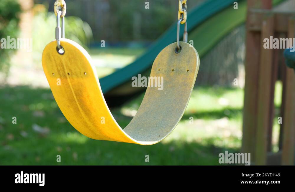 yellow swing in the Garden payset slide outdoors 4k Stock Video Footage ...
