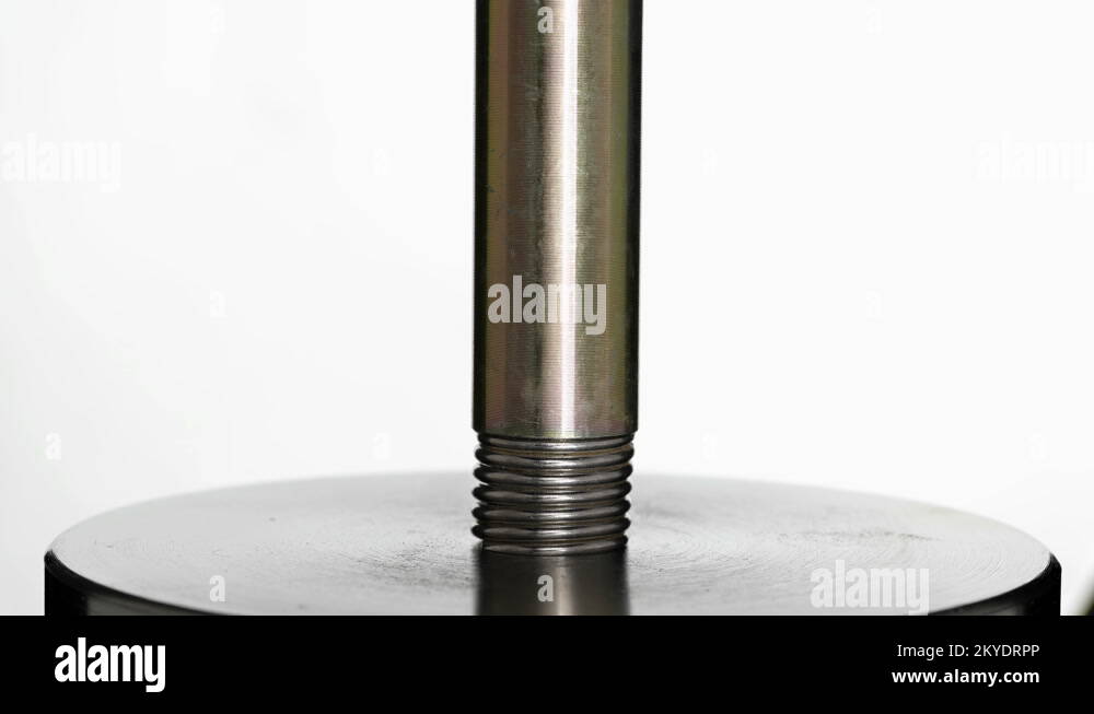 test of reliability of a spring, compression and decompression by a ...