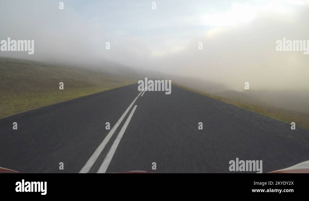 Driving curvy foggy mountain roads, POV hood cam, going down, Iceland ... Driving curvy foggy mountain roads, POV hood cam, going down, Iceland ...