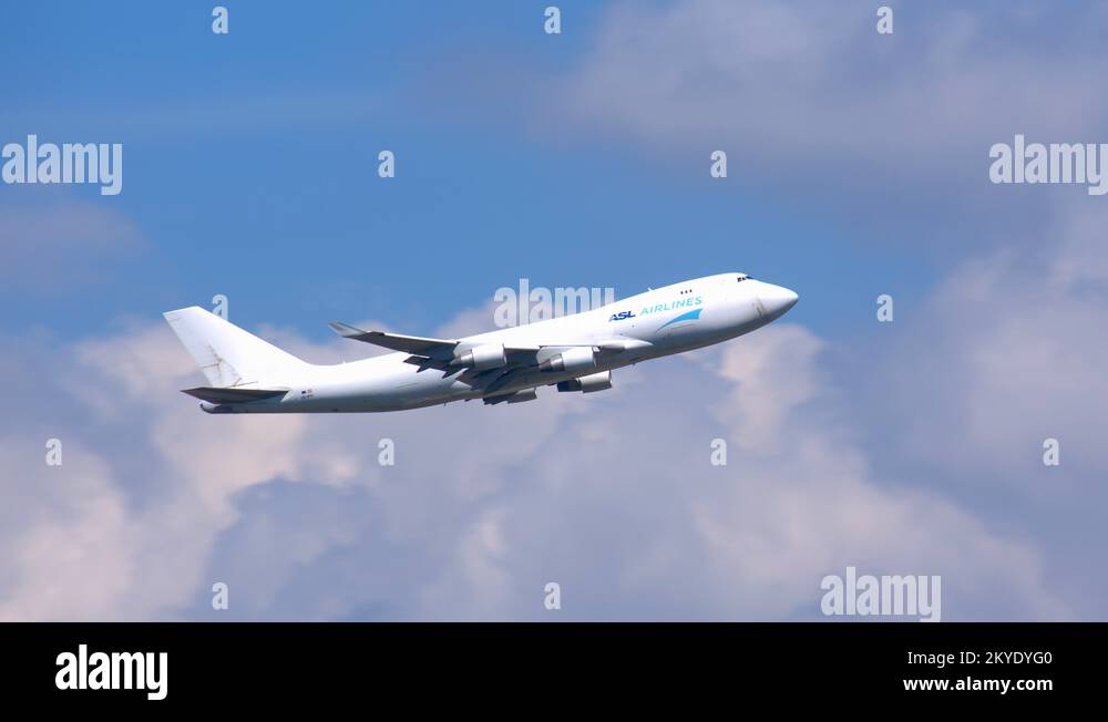 ASL Airlines Boeing 747 Cargo Airplane Flying in a Cloudy Sky Stock ...