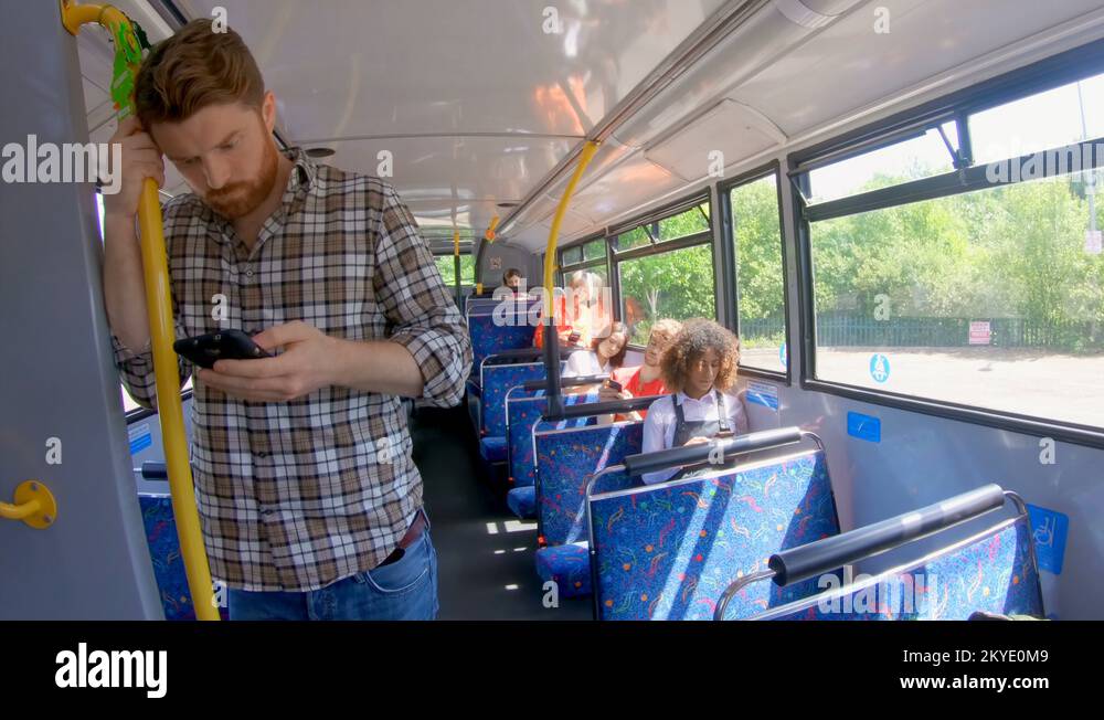 Using phone on bus Stock Videos & Footage - HD and 4K Video Clips - Alamy