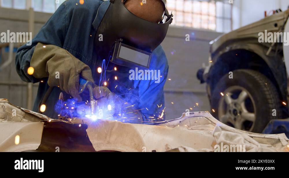Mechanic using wielding torch on a car part 4k Stock Video Footage - Alamy