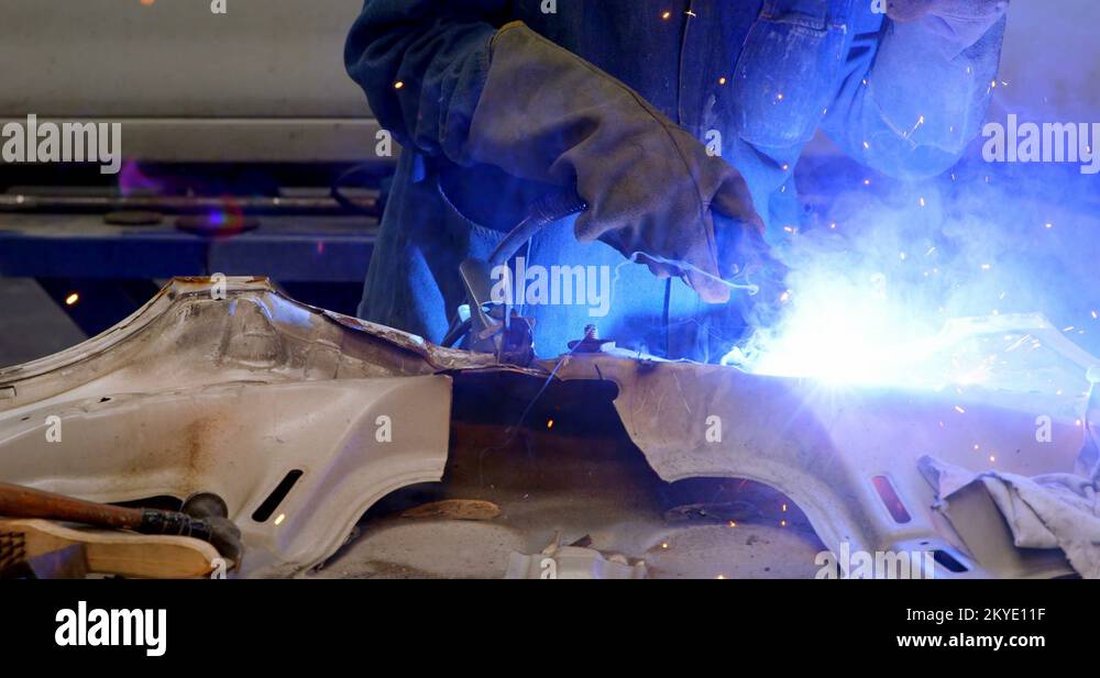 Mechanic using wielding torch on a car part 4k Stock Video Footage - Alamy