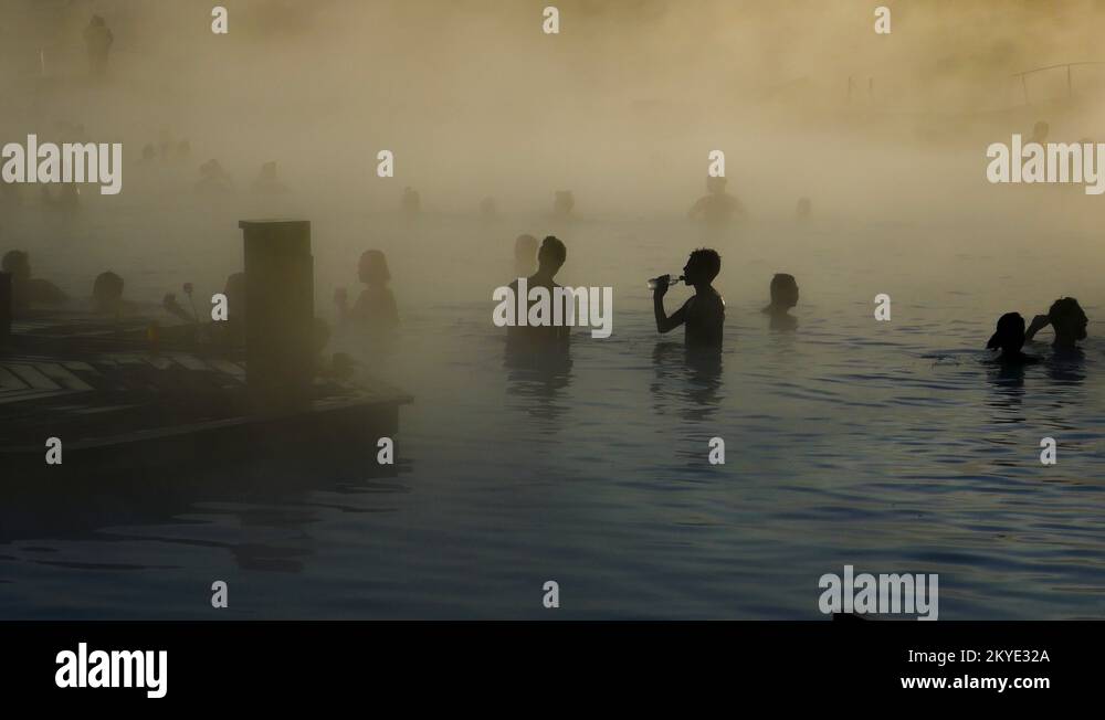 Crowd of people enjoying spa in geothermal mineral hot spring Blue ...