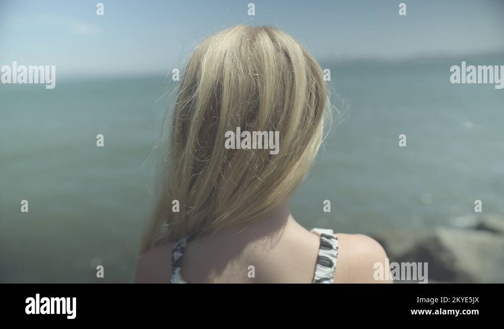 Girl looking at ocean Stock Videos & Footage - HD and 4K Video Clips ...