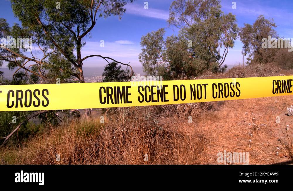 POLICE TAPE AT CRIME SCENE ON A HILLSIDE, 4K HLG Stock Video Footage ...