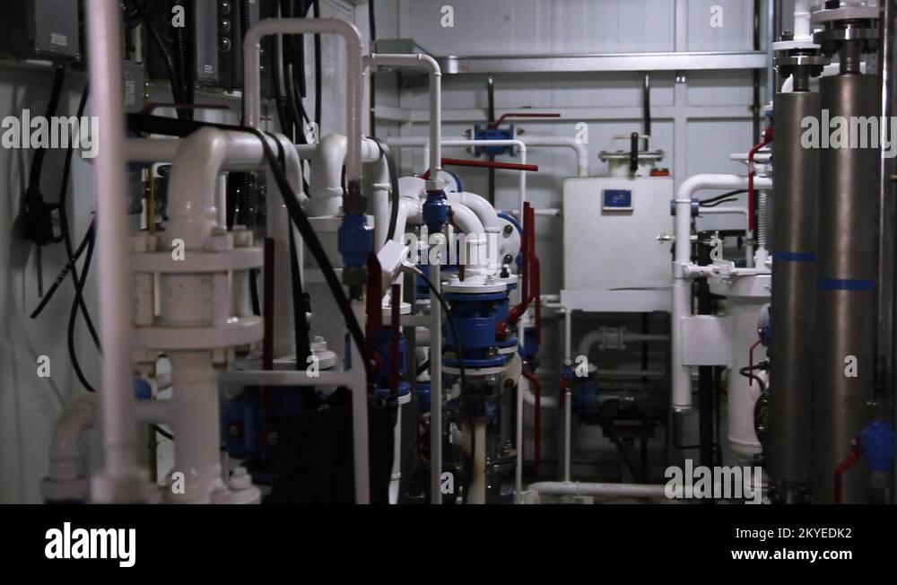System installation in pump room. Scene. Pipes in a boiler room. Water ...