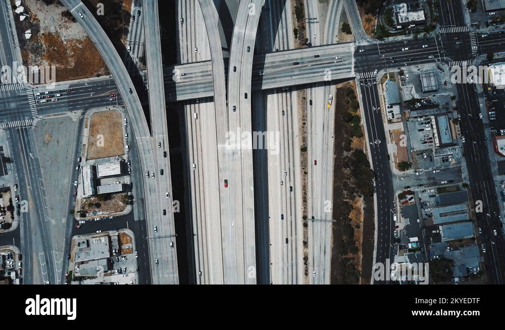 Beautiful drone flyover above large highway junction interchange with ...