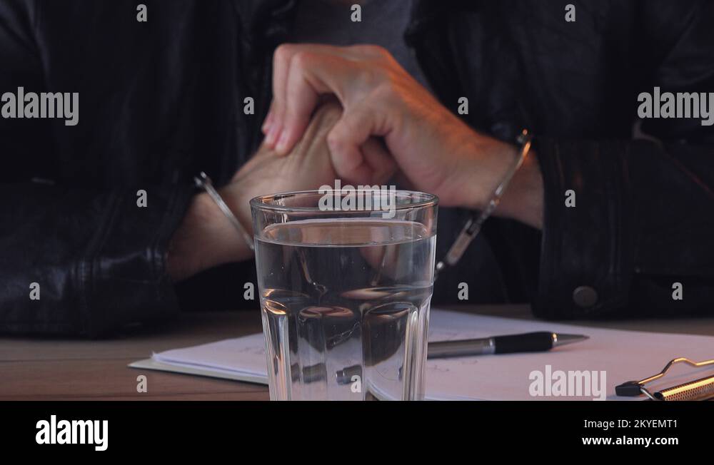 Handcuffed suspect interrogation room Stock Videos & Footage - HD and ...