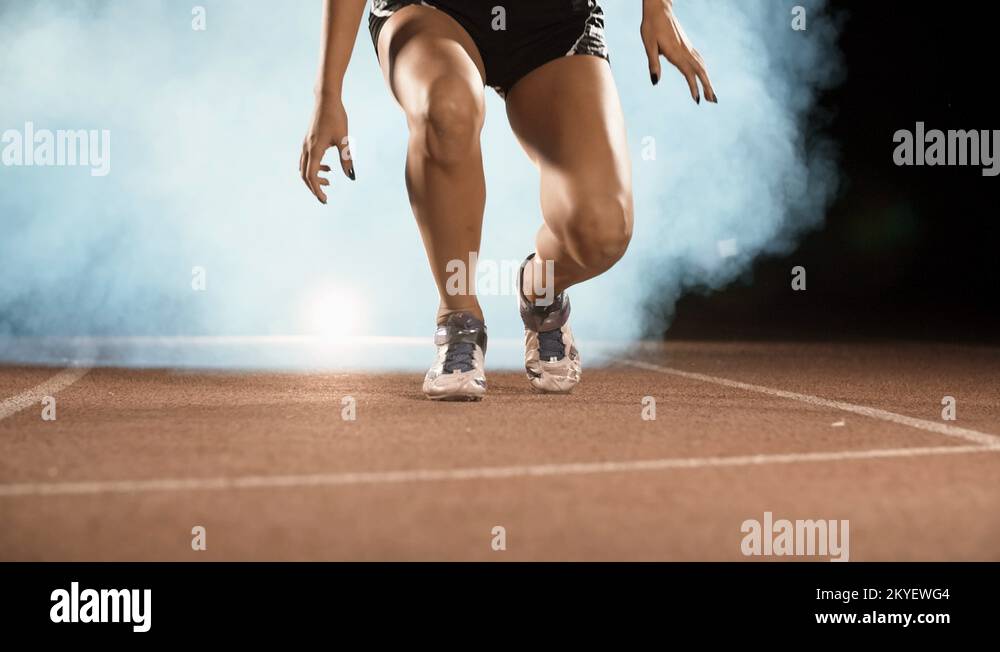 Asian Athlete ready to start. Young female runner preparing for ...