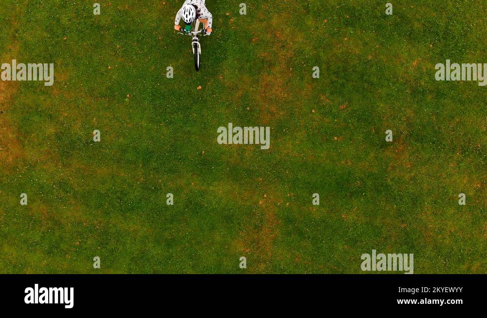Cycling on grass Stock Videos & Footage - HD and 4K Video Clips - Alamy