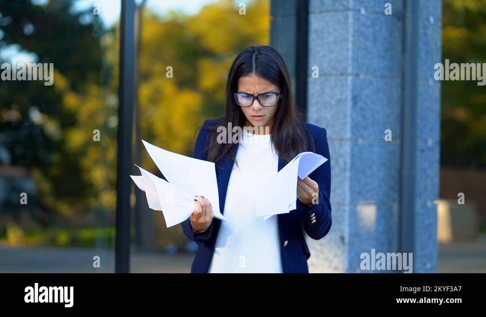 Angry furious female office worker throwing crumpled paper, having ...