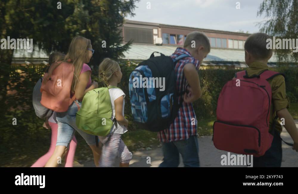 Kids walking to school Stock Videos & Footage - HD and 4K Video Clips ...