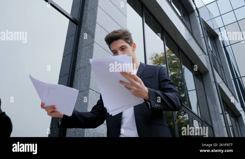 Angry furious male office worker throwing crumpled paper, having ...