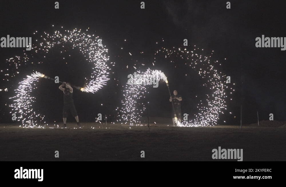 Fire dancers Swing fire dancing show fire show on the beach dance man ...