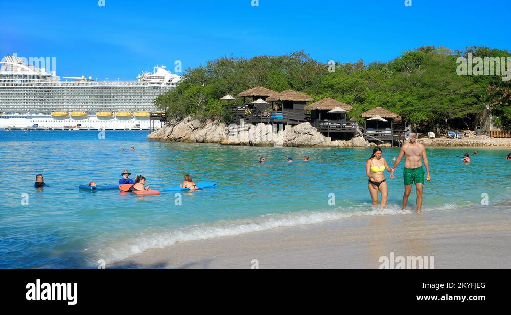 Tourists from Caribbean cruise ship visit Labadee tropical beach in ...