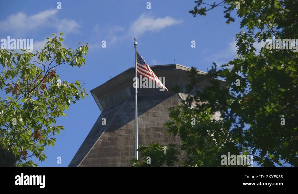 US embassy in Ottawa - low angle view of US flag and rooftop tower ...