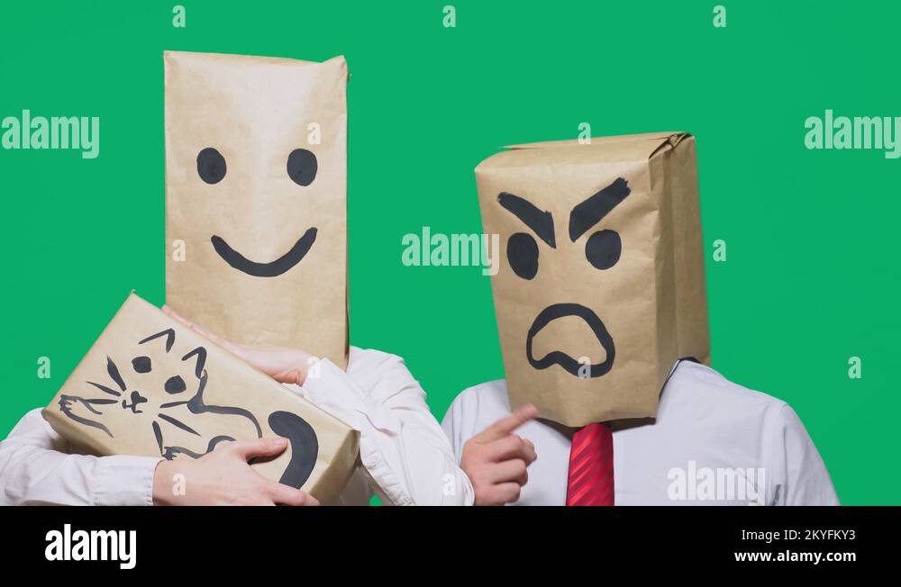 The concept of emotions and gestures. Two people in paper bags with ...