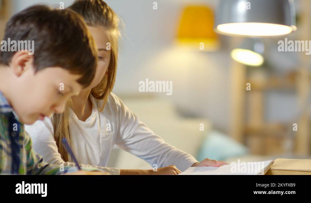 Kid help sibling homework Stock Videos & Footage - HD and 4K Video ...