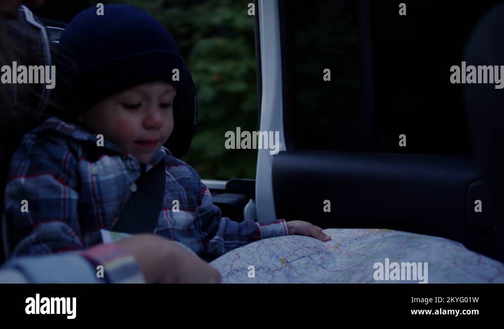 Boy looking at map Stock Videos & Footage - HD and 4K Video Clips - Alamy