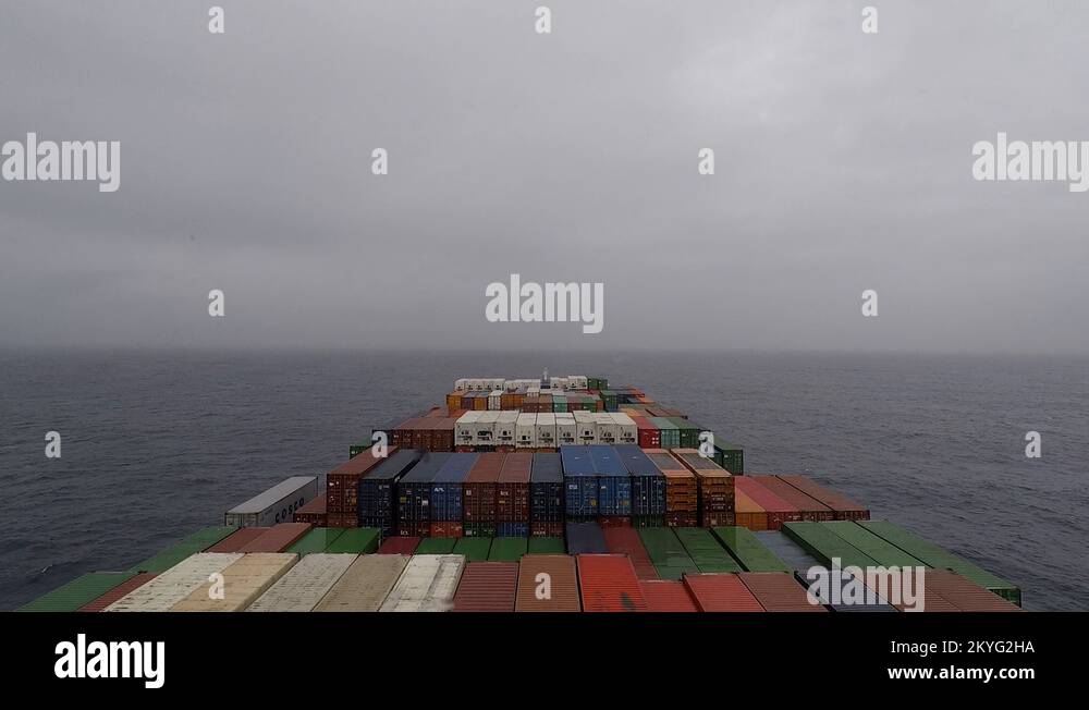 Onboard of huge Container ship during underway, center view, foggy ...