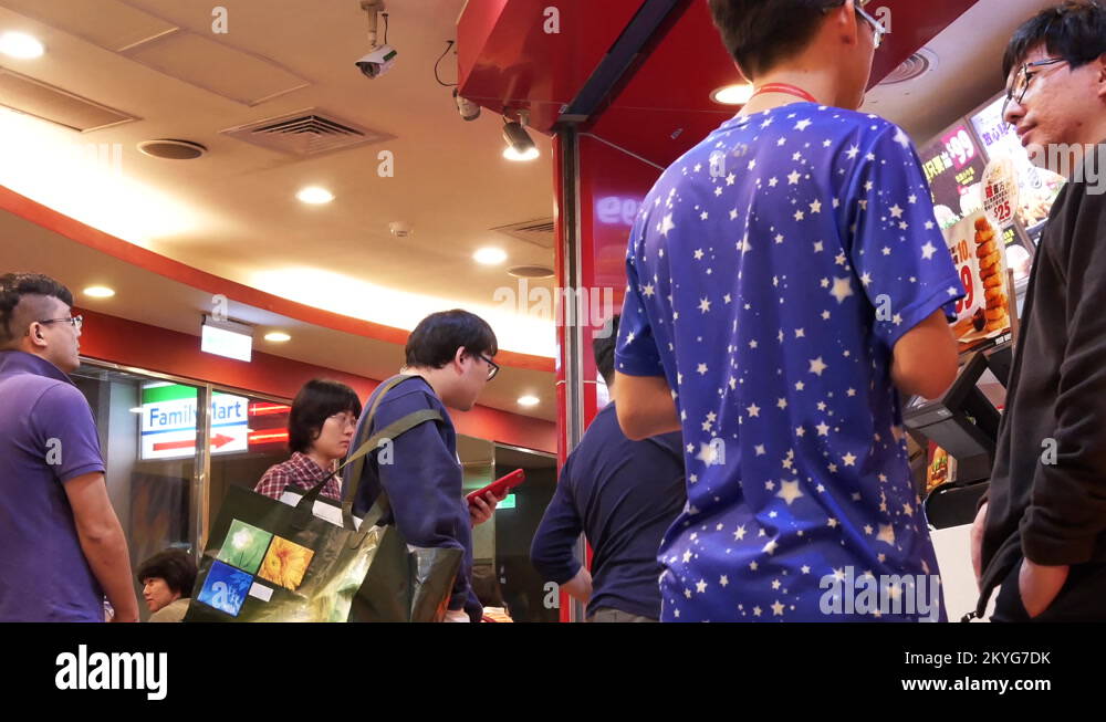 Motion of people ordering food at check out counter at Burger King ...