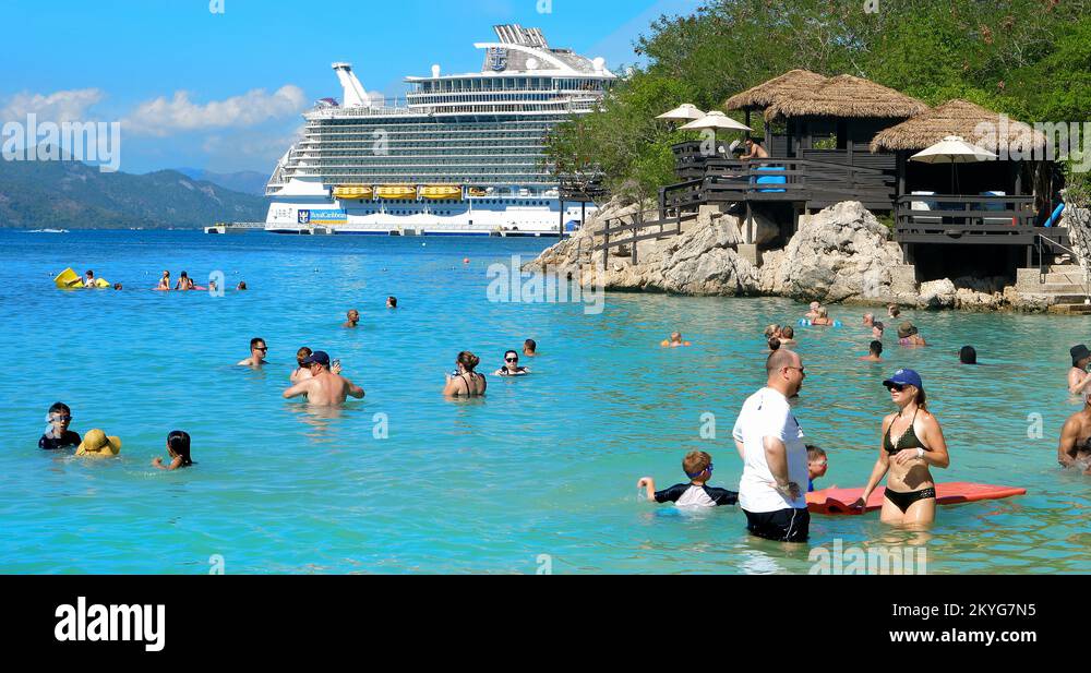 Tourists from Caribbean cruise ship visit Labadee tropical beach in ...