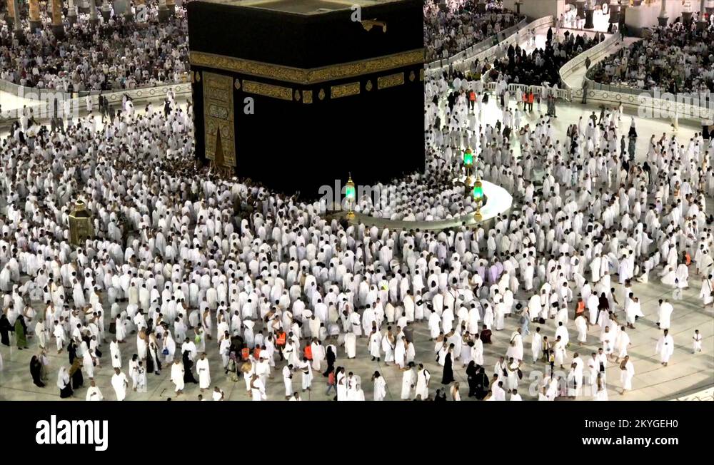 Muslim pilgrims circumambulating and pray facing the Kaaba Stock Video ...