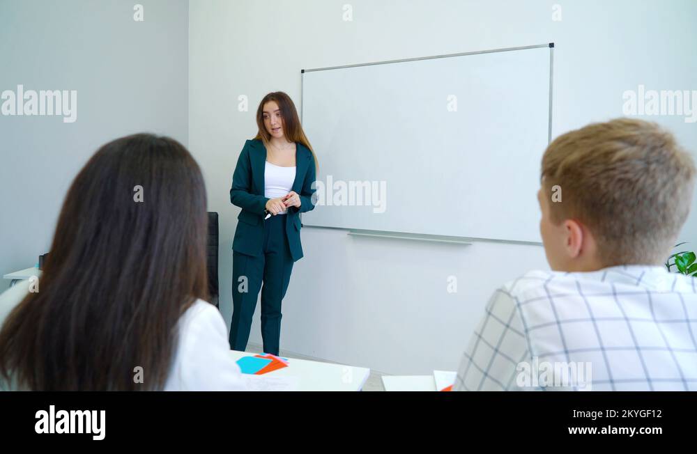 Teacher writing whiteboard classroom Stock Videos & Footage - HD and 4K ...