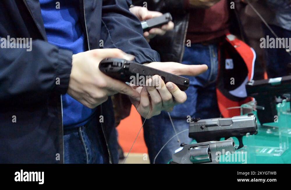 Hand holding machine gun Stock Videos & Footage - HD and 4K Video Clips ...