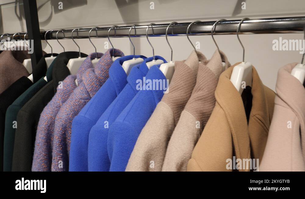 10 Coats and dress boutique store interior in a shopping mall center ...