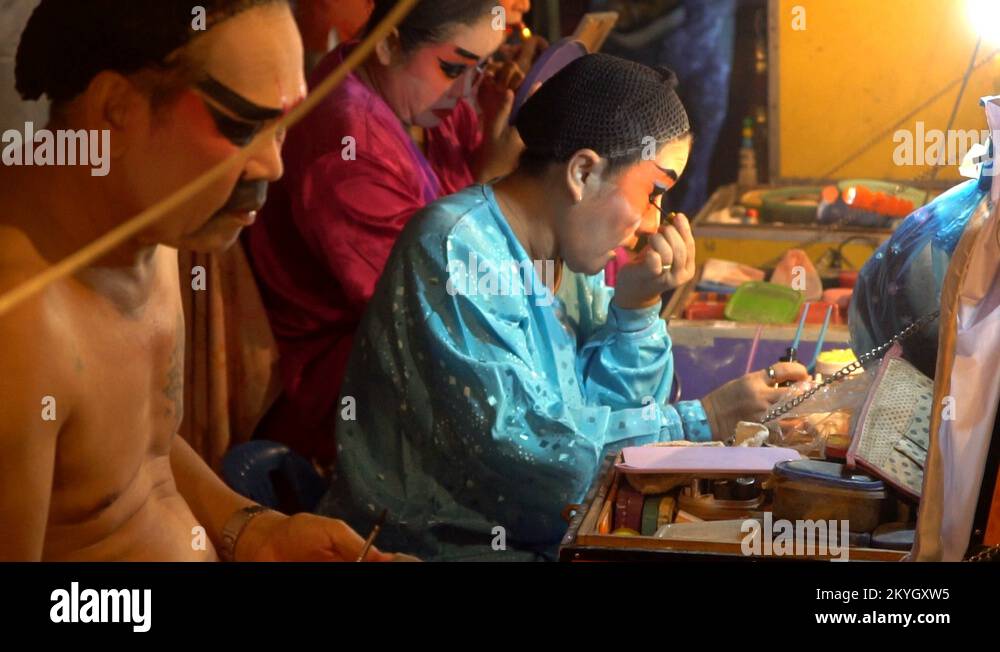 Chinese opera performer applies make-up backstage Stock Video Footage ...