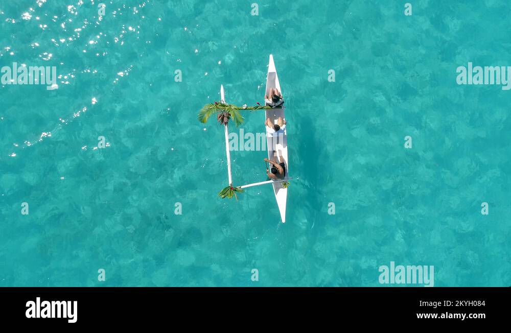 Native in outrigger canoe Stock Videos & Footage - HD and 4K Video ...