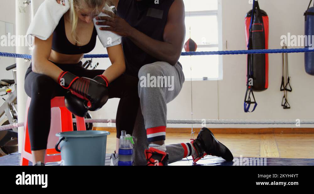 Female boxer relaxing in boxing ring 4k Stock Video Footage - Alamy