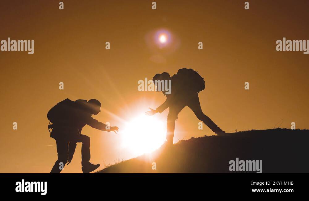 teamwork people tourists business travel trip lends a helping hand. two ...