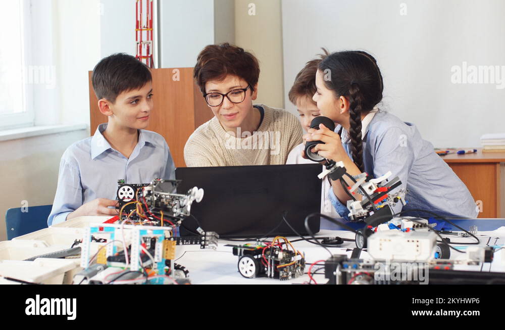 Happy children learn programming using laptops on extracurricular ... Happy children learn programming using laptops on extracurricular ...