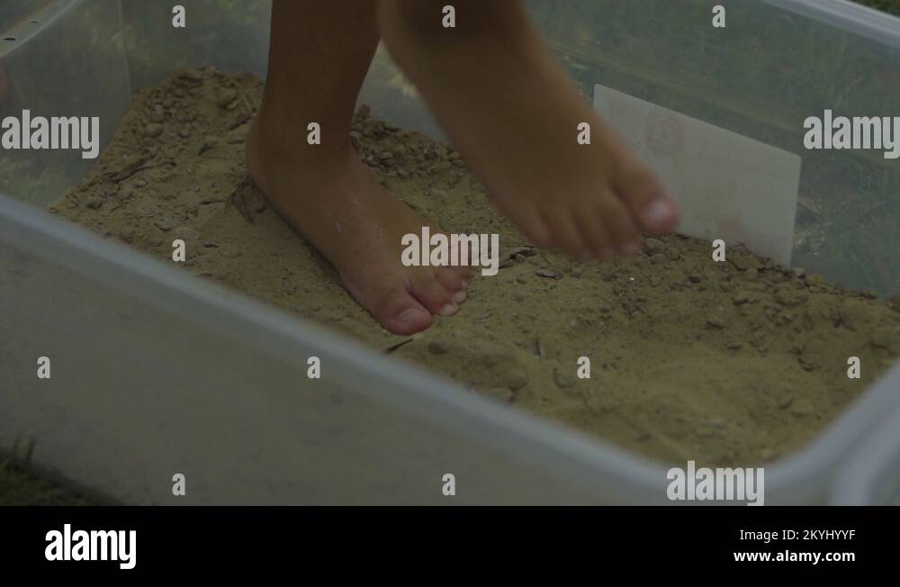 Summer Sensory Play. Child's Feet Walking On Different Textures ...