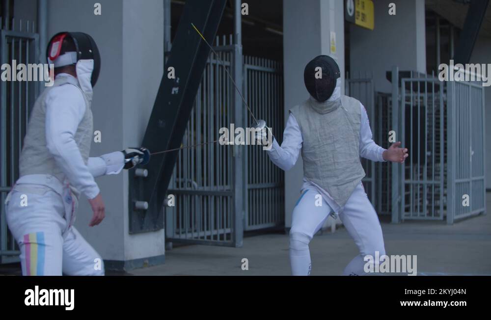 Two fencing sportsmen during a friendly fight display Stock Video ...