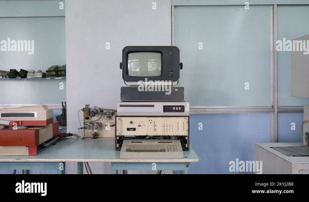 Old computer with CRT monitor with keyboard in classroom. Concept ...
