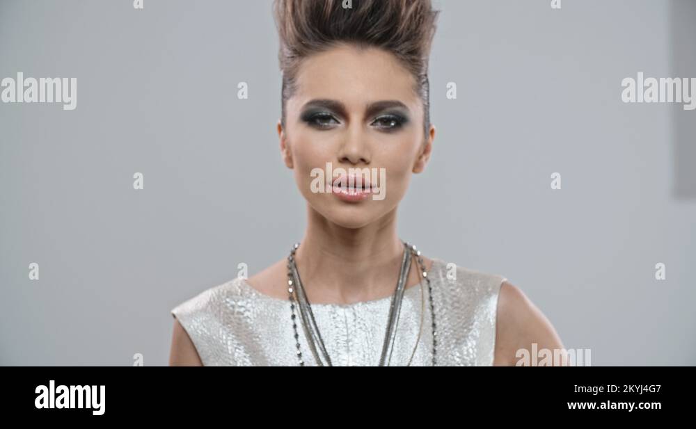 Young professional turkish model posing on stage for fashion magazine ...